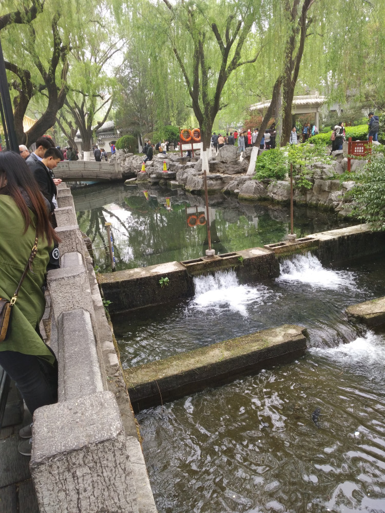 ‘Lucky’ coins that visitors throw into Chinese spring risk polluting ...