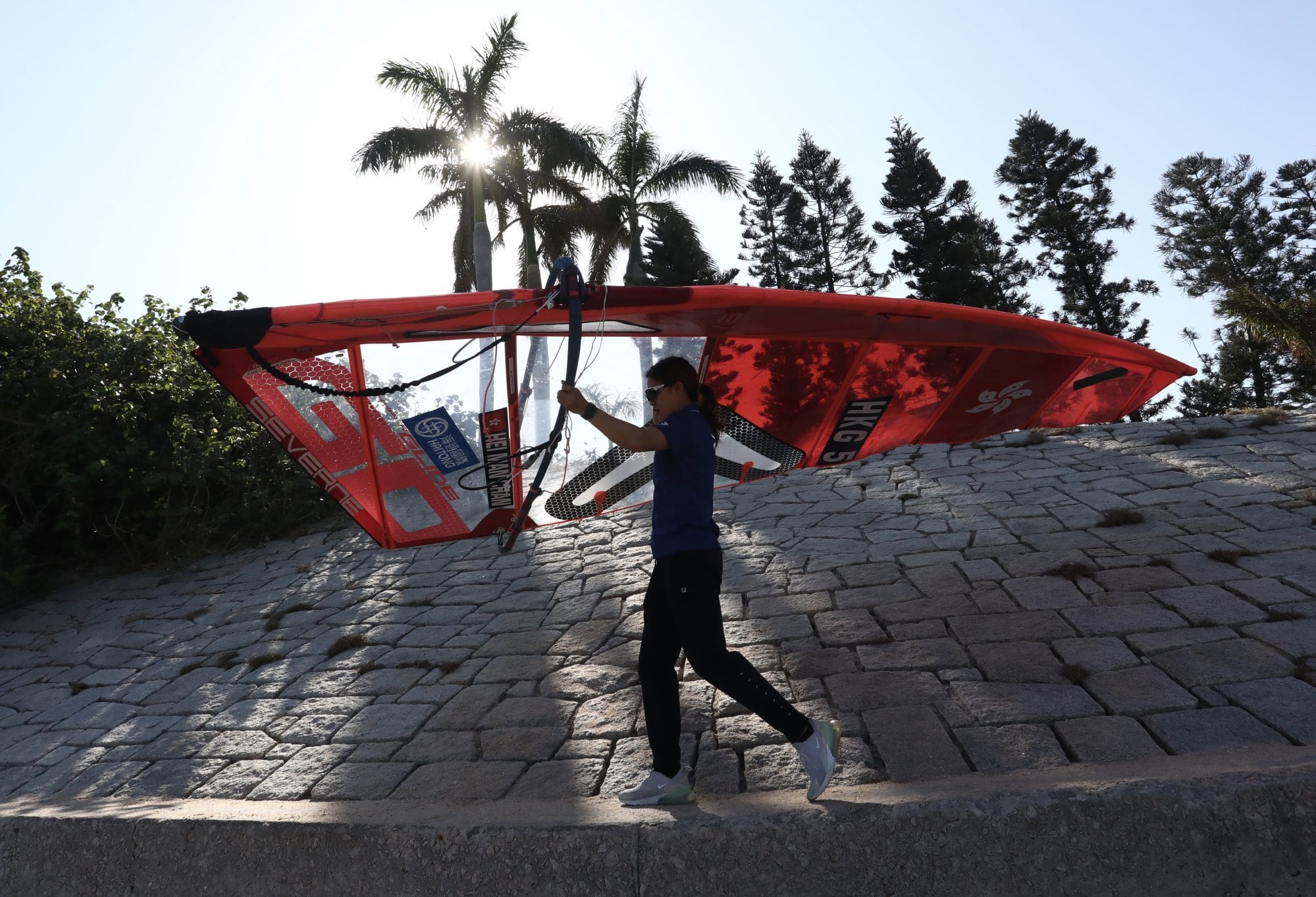 Olympic windsurfer Hayley Chan returns to school but continues as part ...