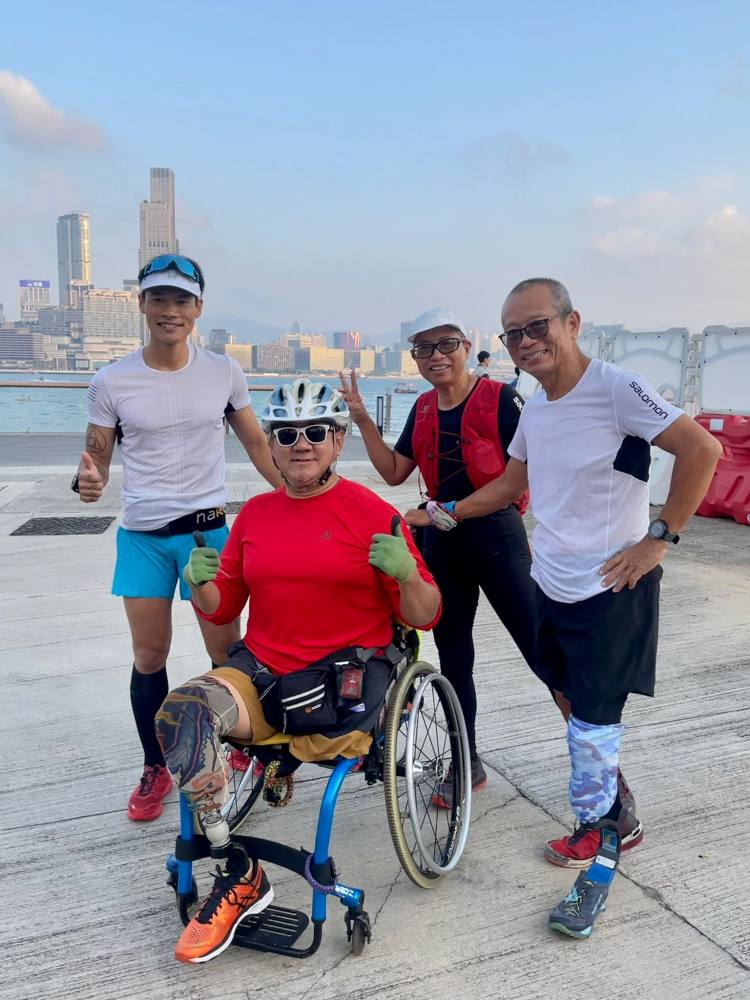 Runner Wong Ho-fai wants to push a wheelchair-bound companion across ...