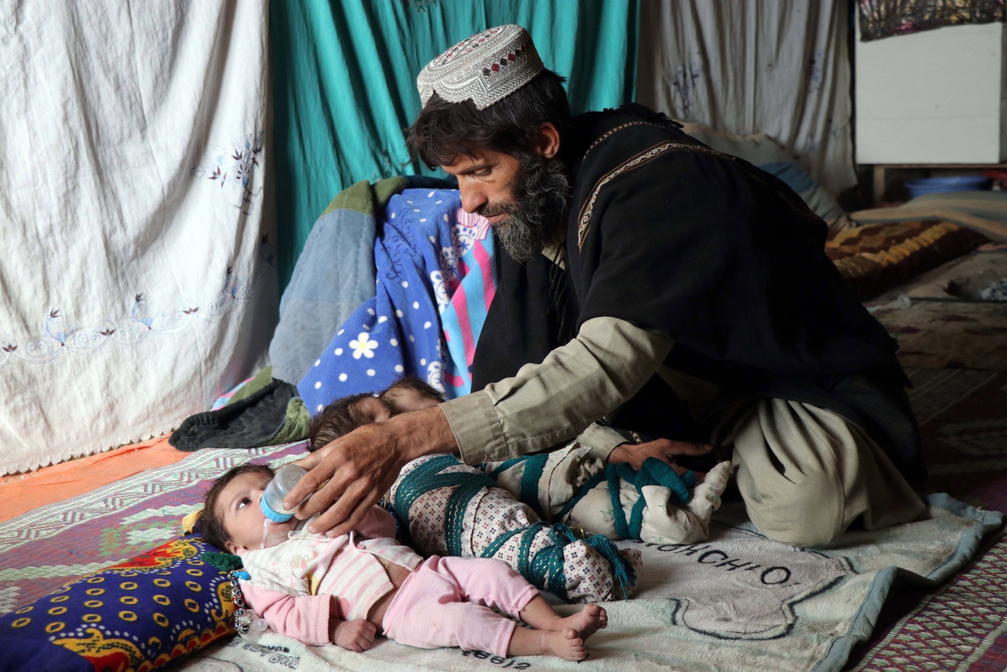 Taliban to resume issuing Afghan passports as humanitarian crisis grows ...