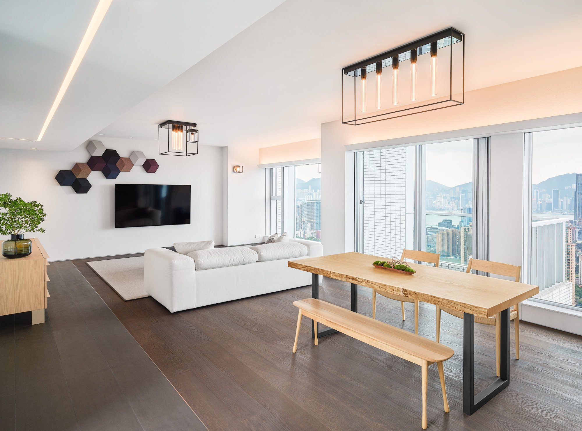 A couple’s minimalist apartment pares down furniture to the bare ...