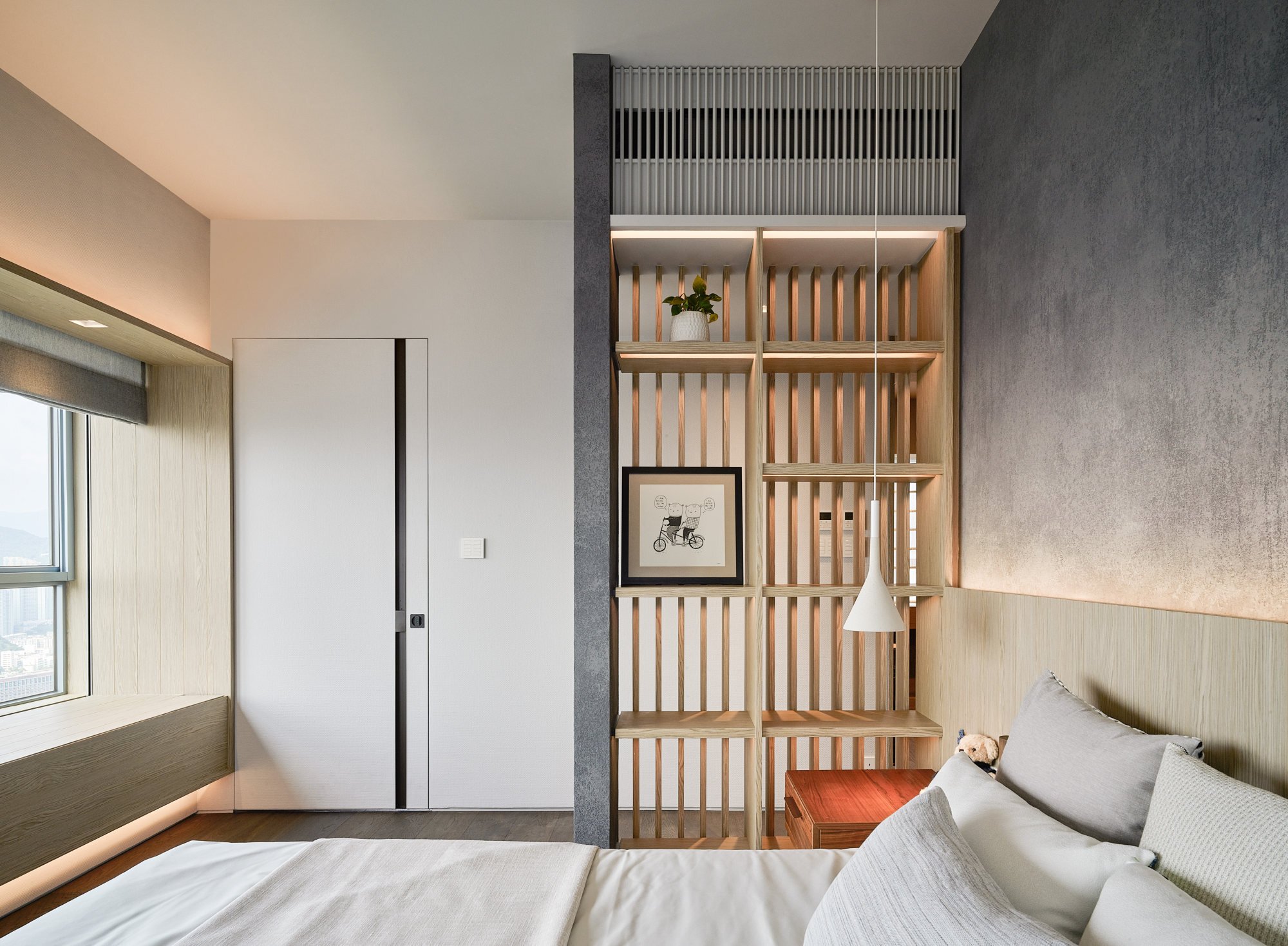A couple’s minimalist apartment pares down furniture to the bare essentials to emphasise its ...