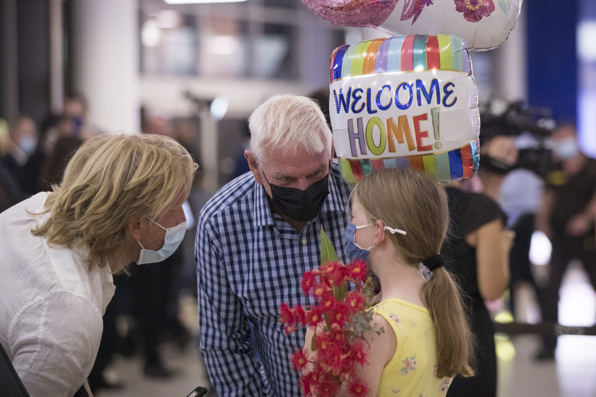 Australia welcomes back travellers with joy, tears, Vegemite as border ...