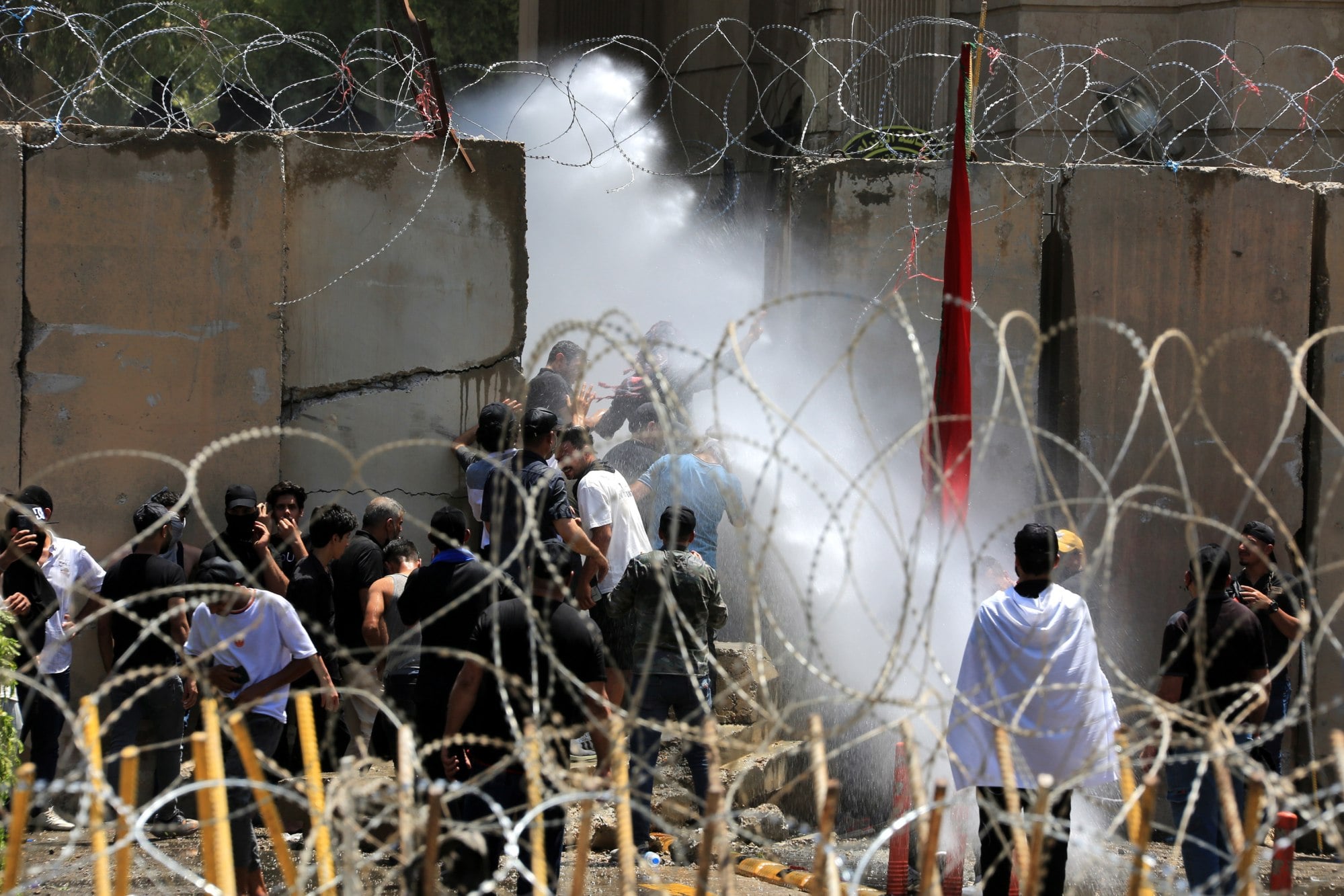 Thousands of Iraqi protesters storm parliament in Baghdad, set up sit ...