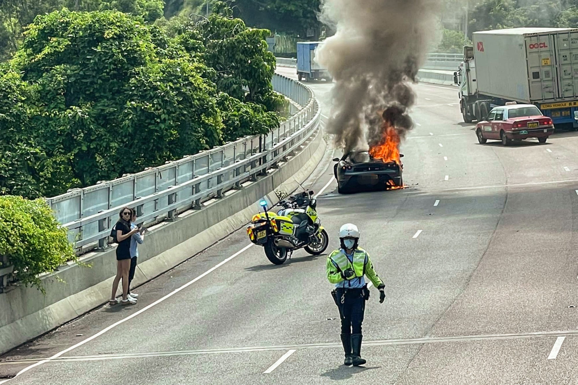 Firefighters called to douse flaming Ferrari sports car on Hong Kong ...