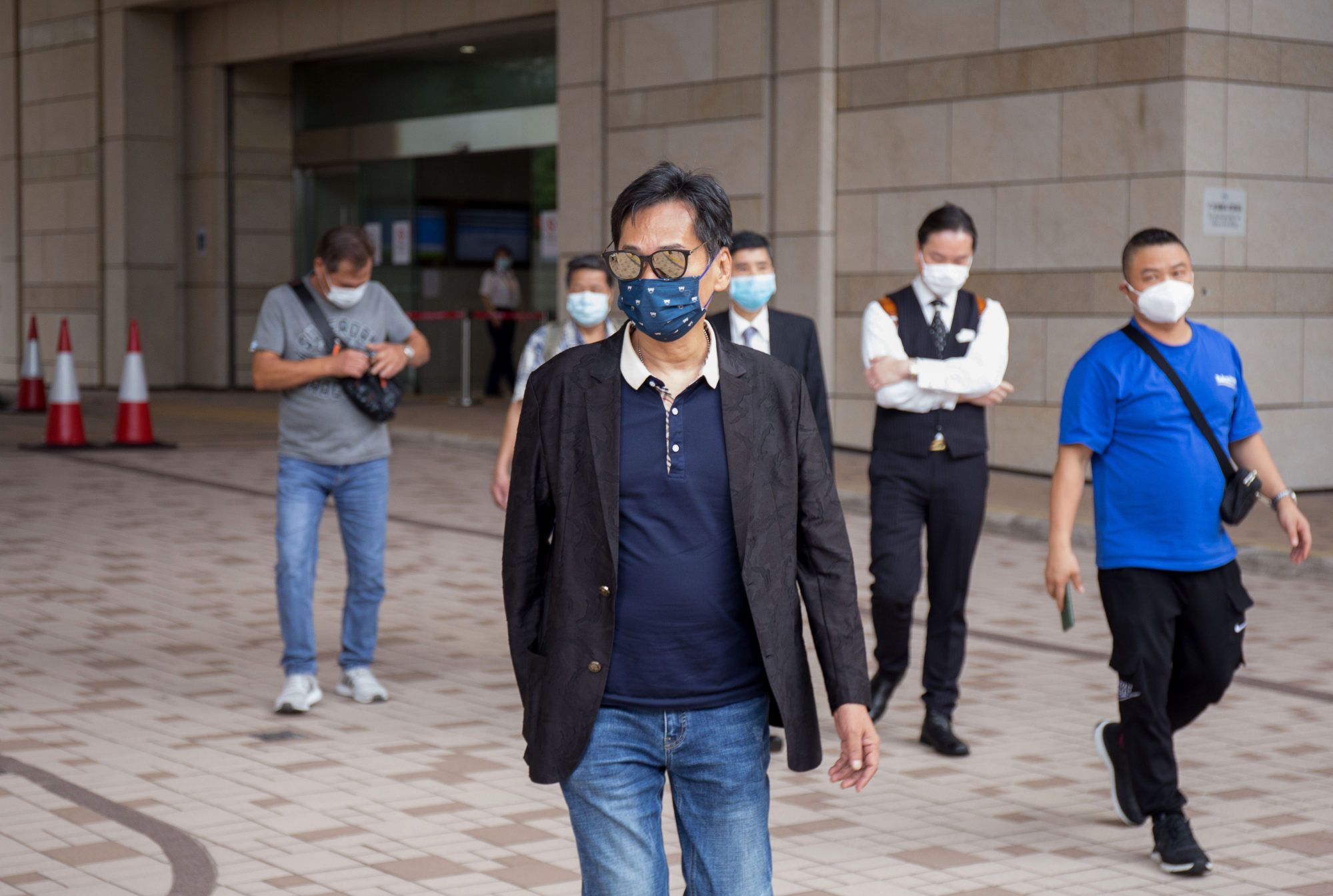 Hong Kong protests: man, 64, found guilty of rioting and wounding in ...