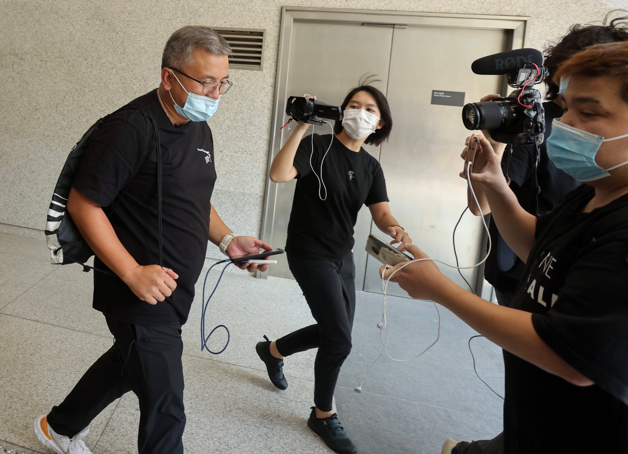 Head of journalist group allowed to leave Hong Kong while awaiting ...