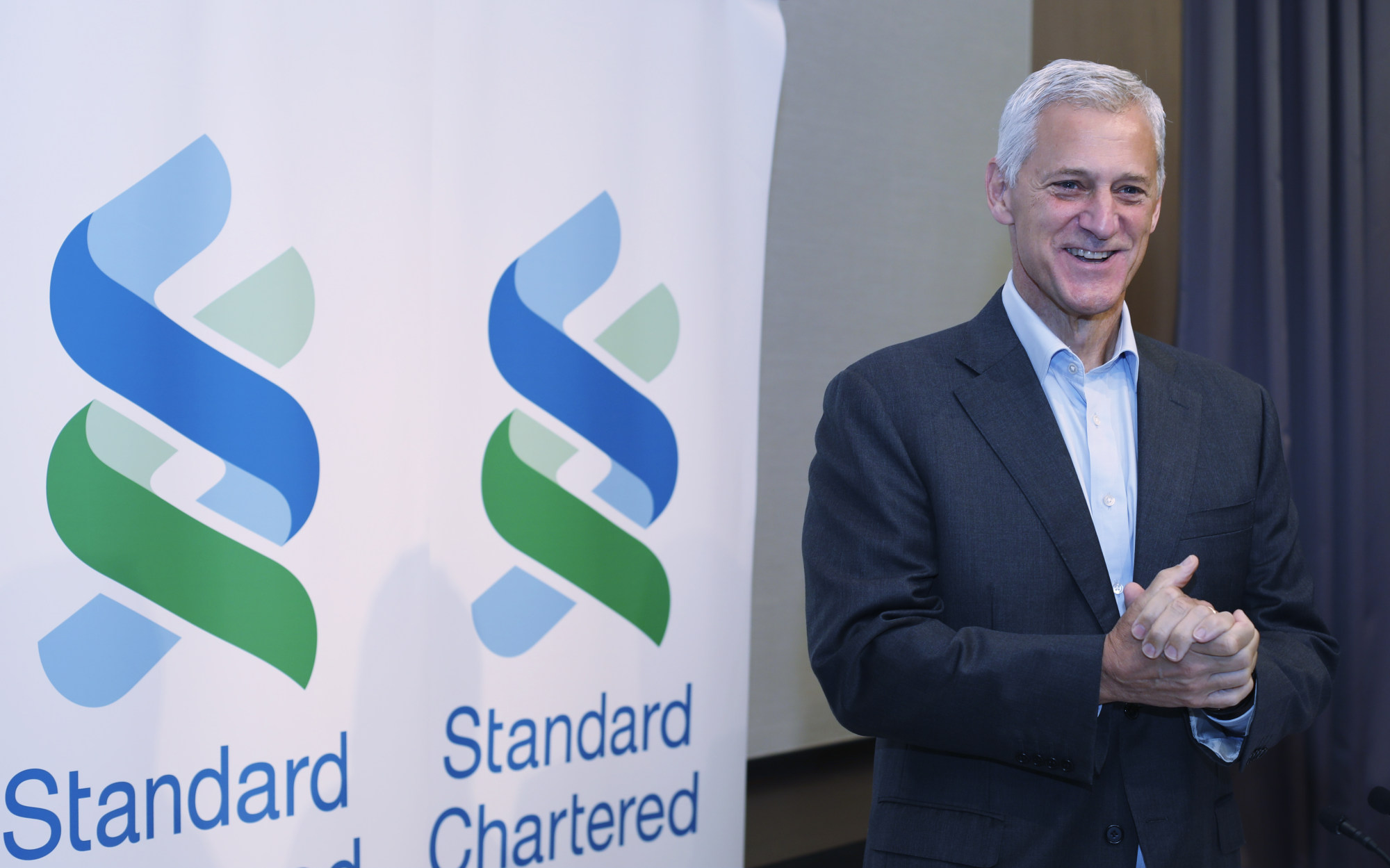 Standard Chartered’s third-quarter profit beats expectations on higher ...