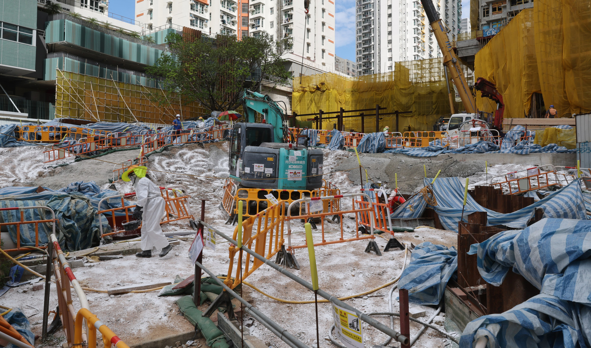 10 Hong Kong construction workers test positive for bacterium that ...