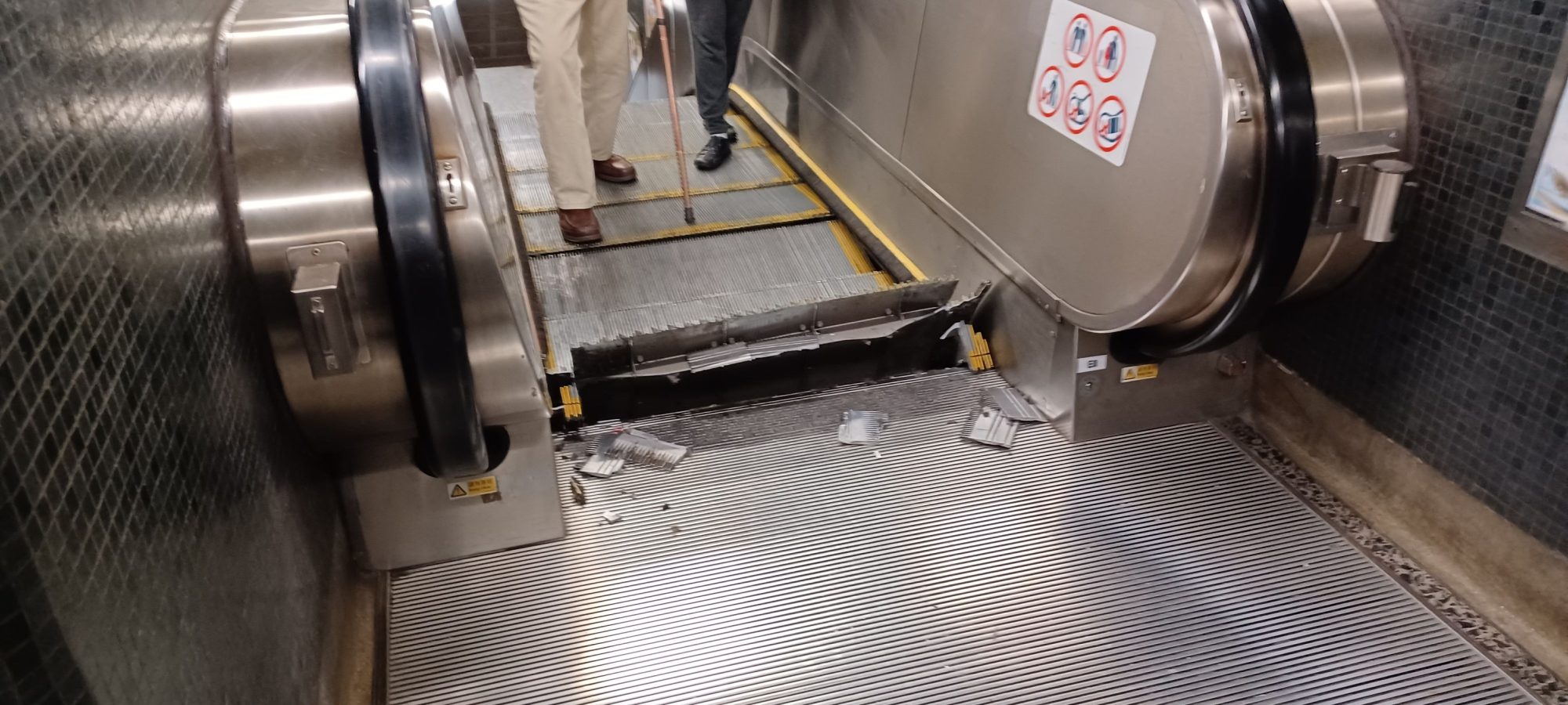 Escalator at Hong Kong MTR railway station breaks down when clothing ...