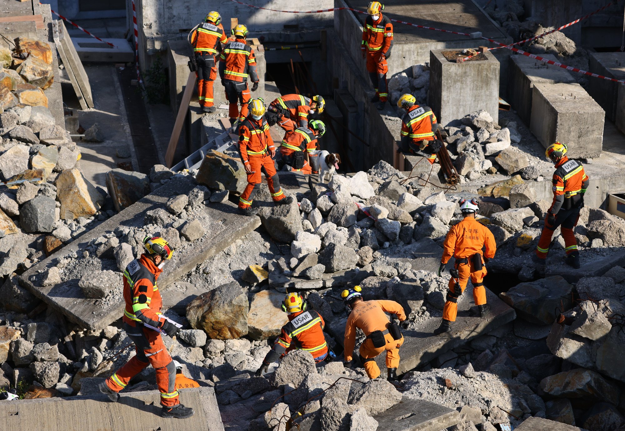 Collapsed buildings, rescue drones and survivors under rubble: Hong ...