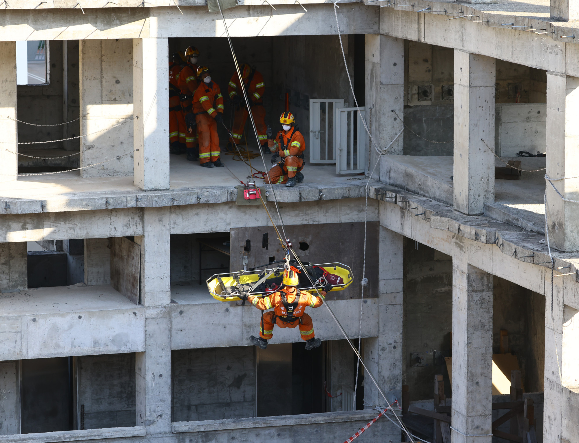 Collapsed buildings, rescue drones and survivors under rubble: Hong ...