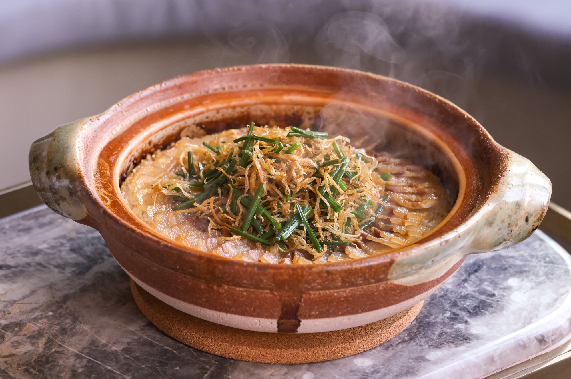 Wagyu, pork belly, cured meats: clay pot rice goes luxe in the hands of ...