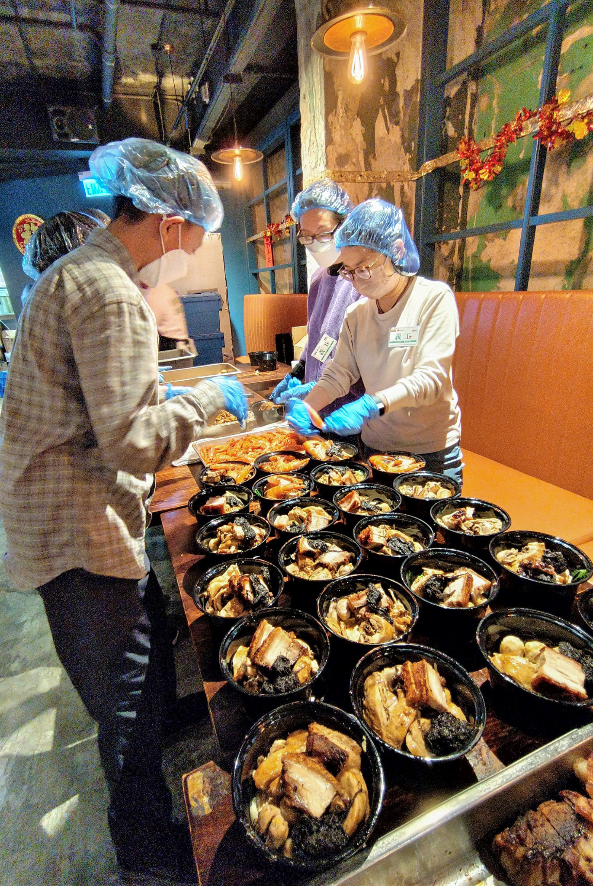 ‘We hope to bring them joy’: charities, businesses serve free hot meals ...