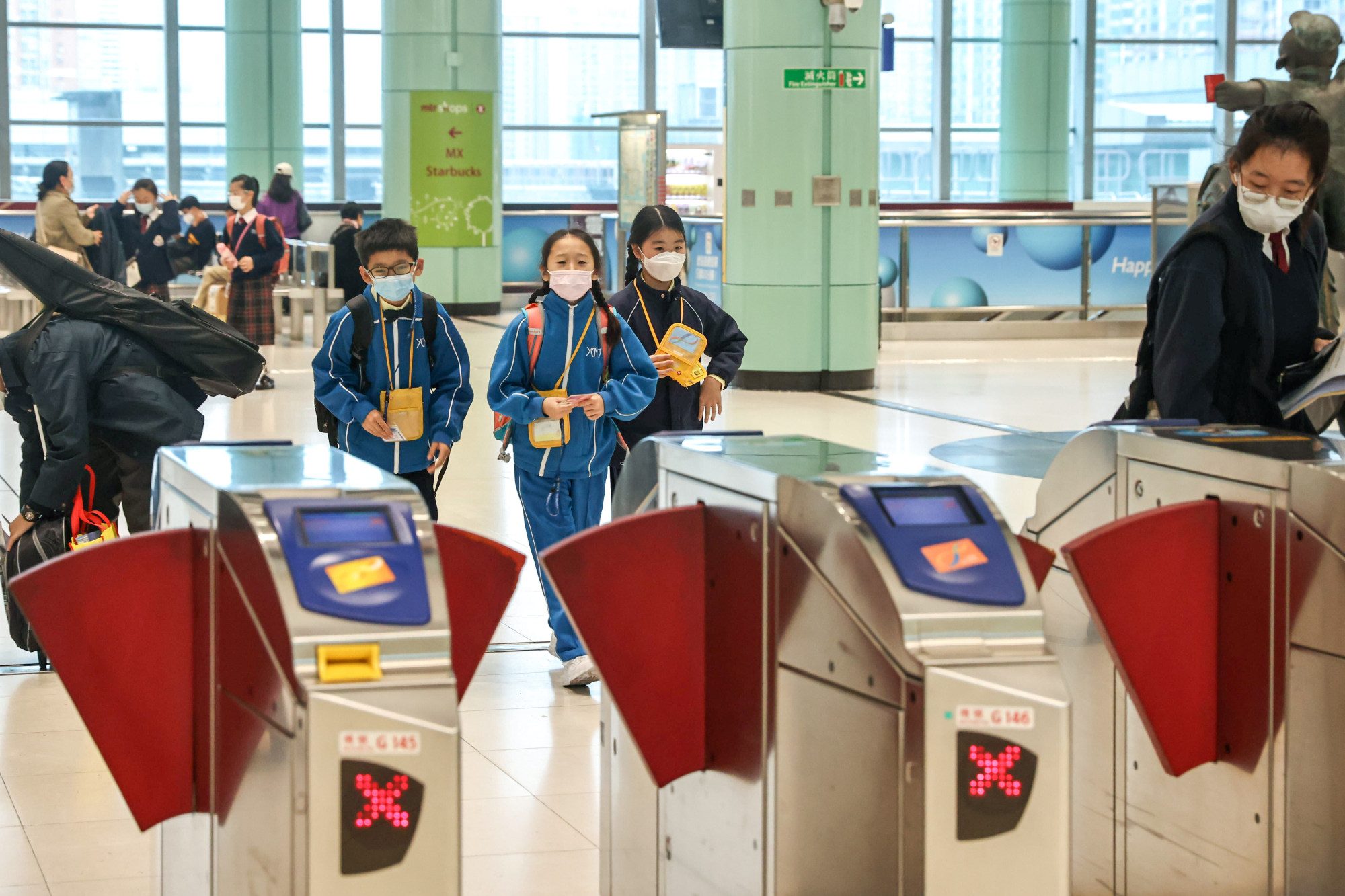 Hong Kong cross-border students return to in-person classes after 3 ...