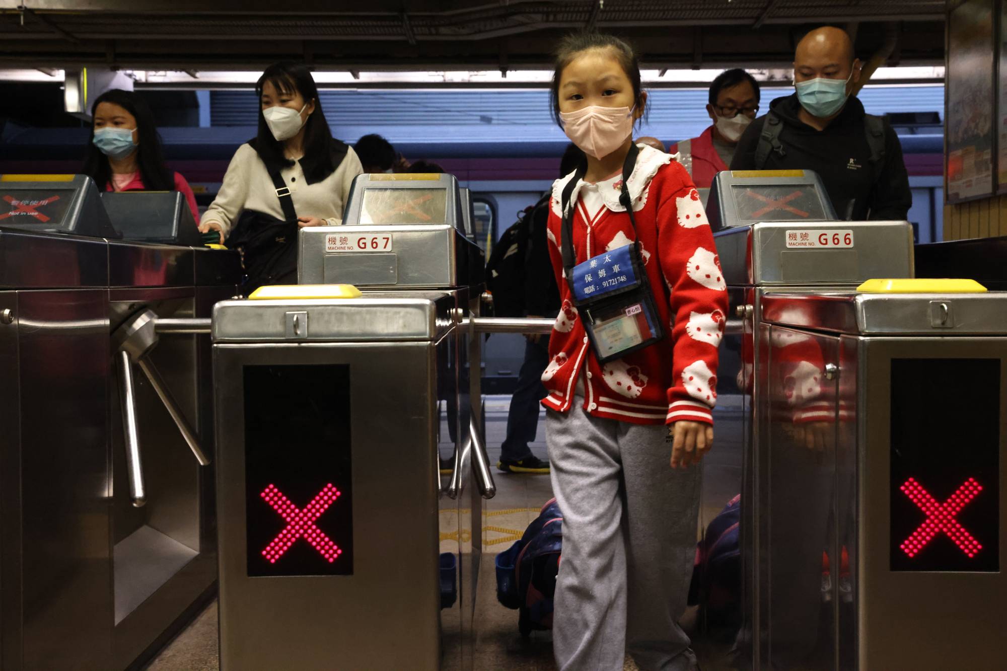 Hong Kong welcomes back cross-border students as parents, children hail ...