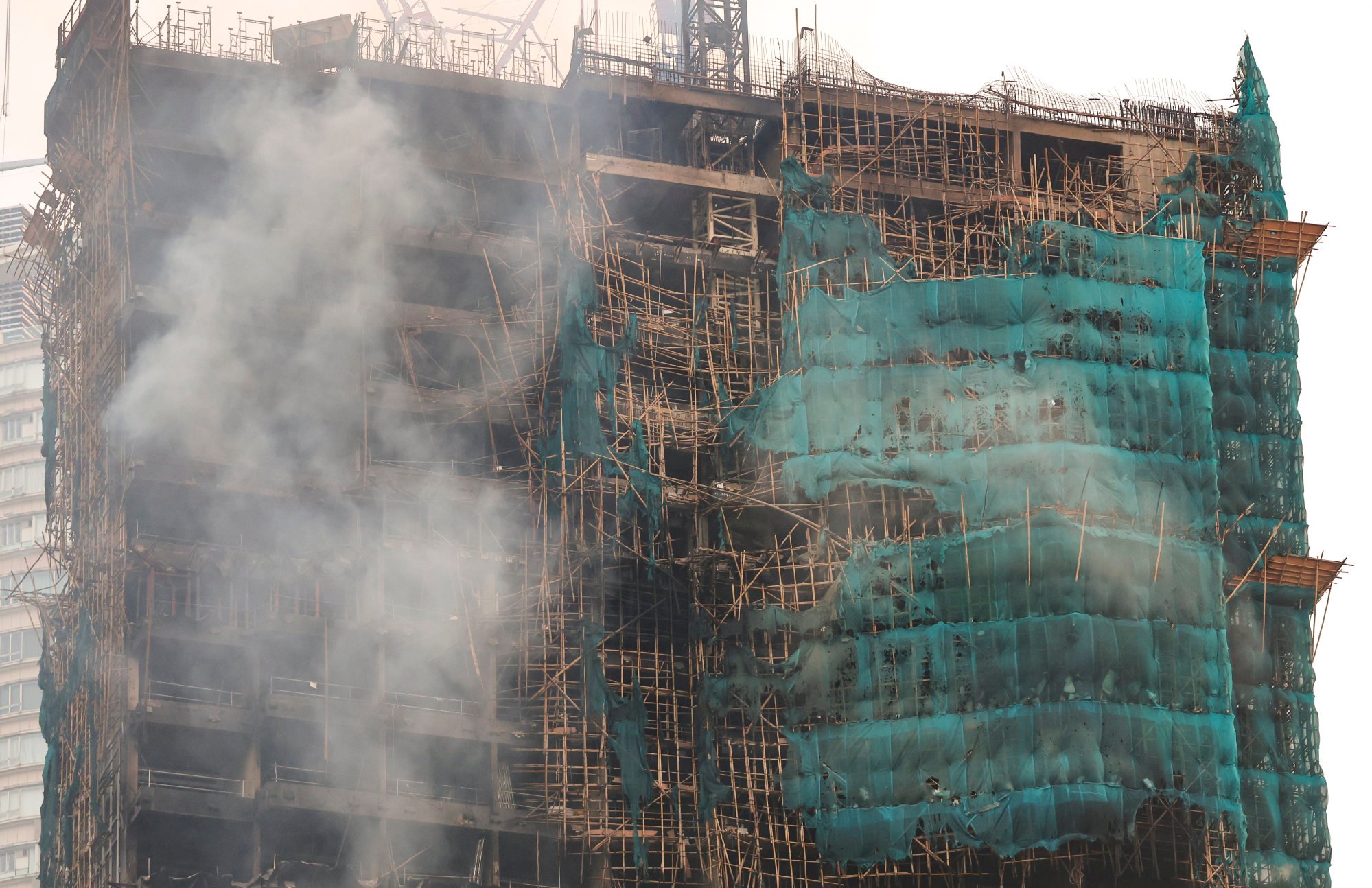 Safety checks at skyscraper after Hong Kong firefighters battle blaze ...