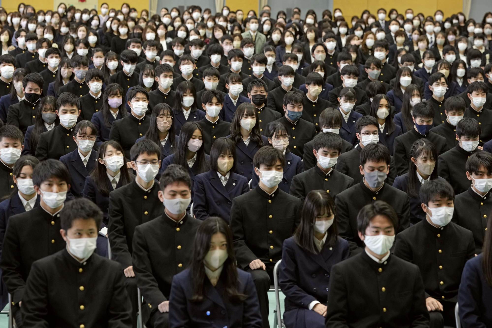 Japan marks mask-free Monday – with most people still wearing masks ...