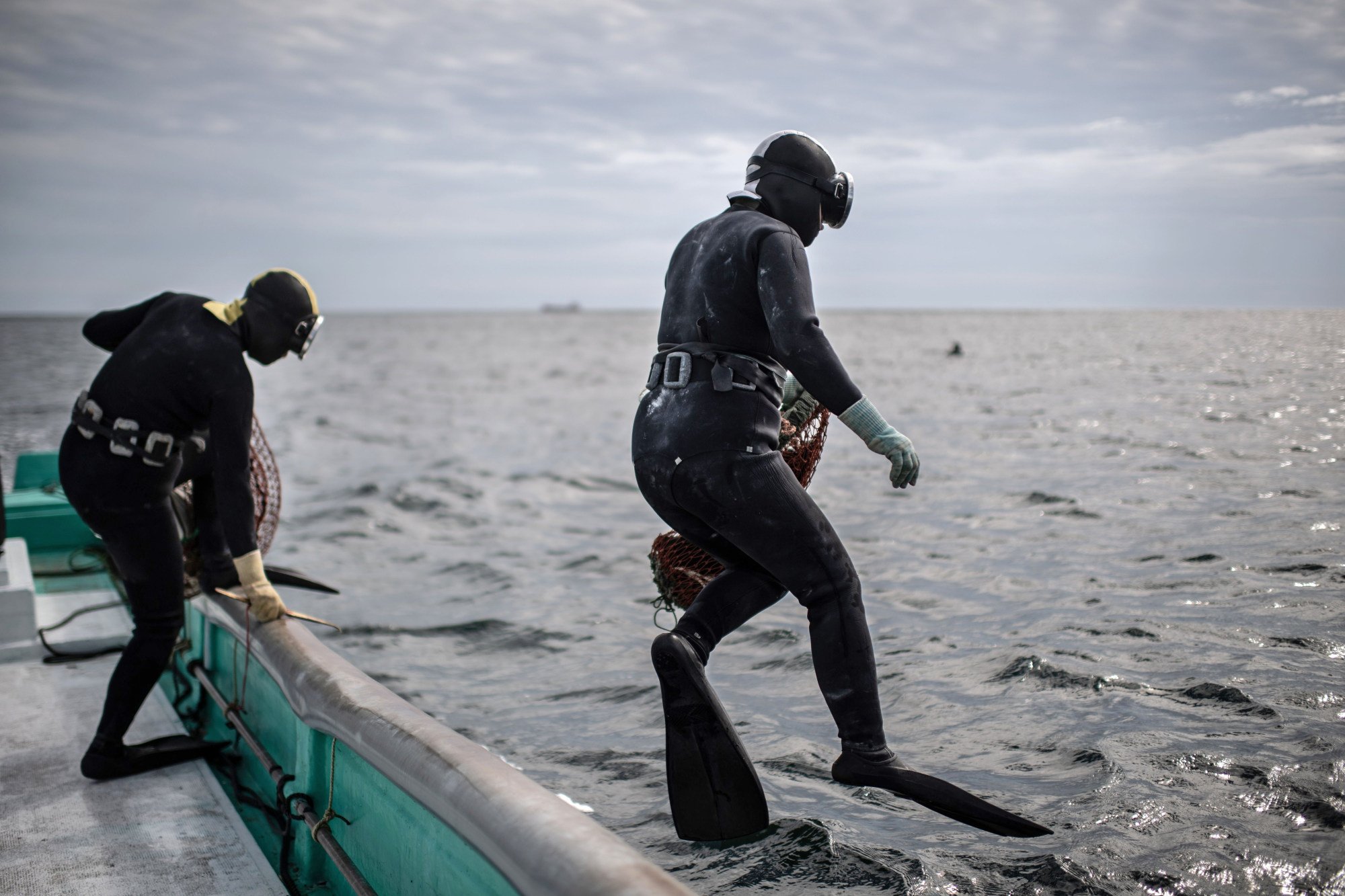 Japan’s ‘ama’ divers struggle to stay afloat as rising sea temperatures ...