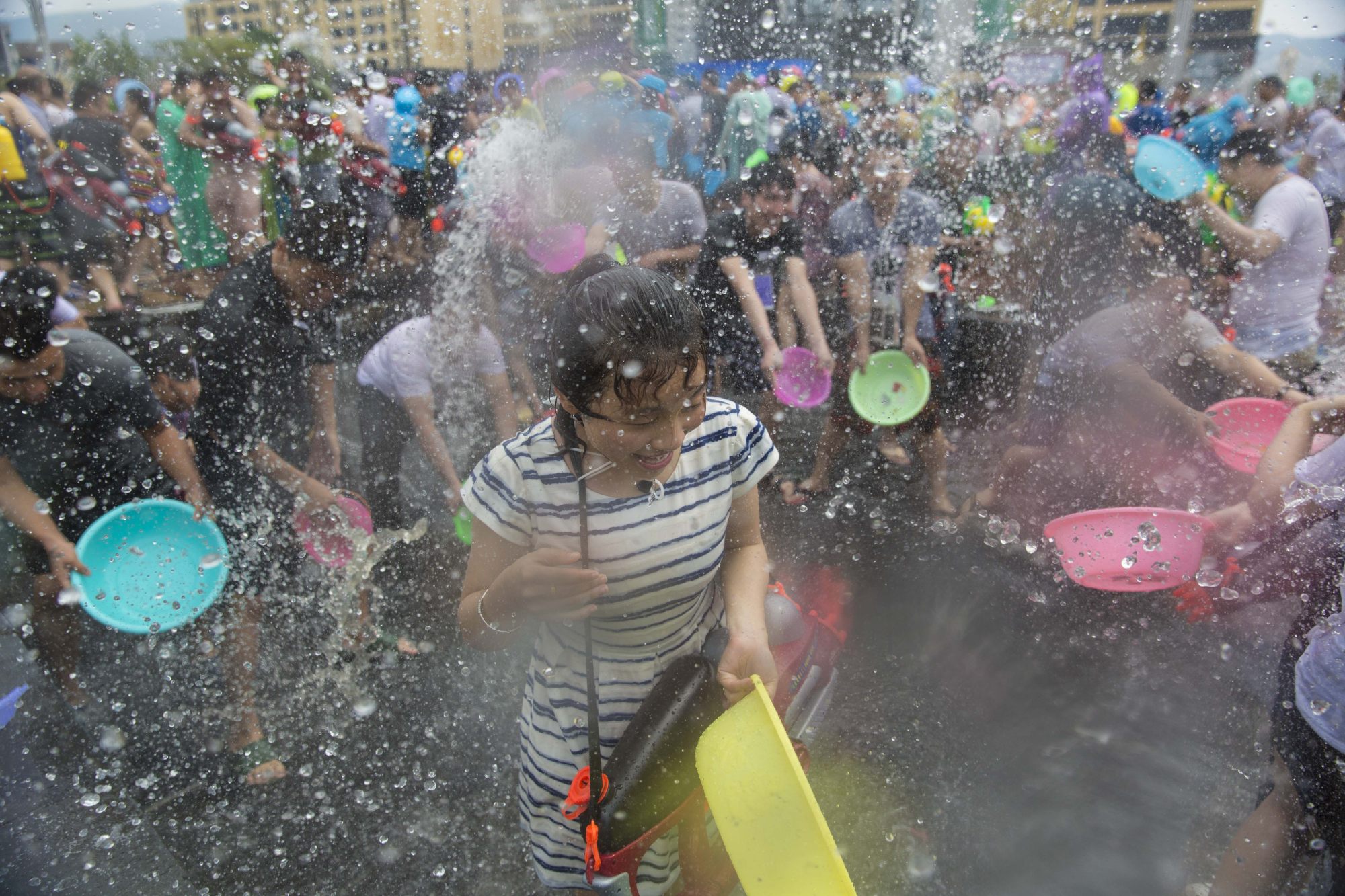 ‘Men surrounded my friend’: woman at splashing festival hit in face and ...