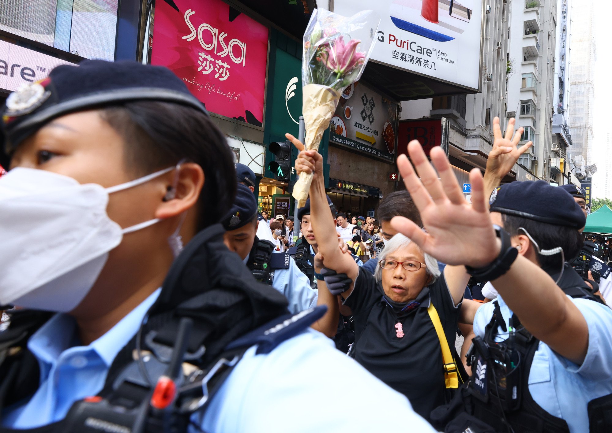 Hong Kong Police Arrest Woman Detain 23 Others As Security Tightened