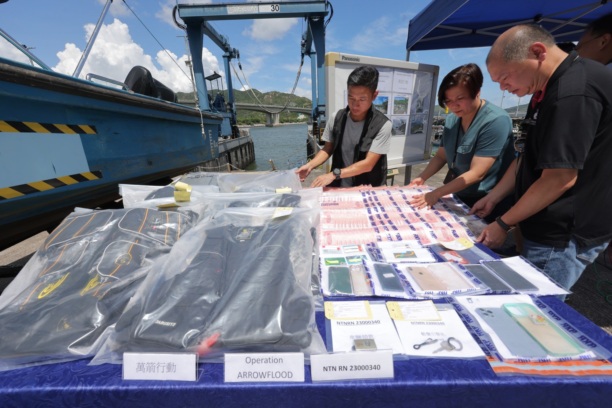 Hong Kong police smash alleged people-smuggling syndicate after dawn ...