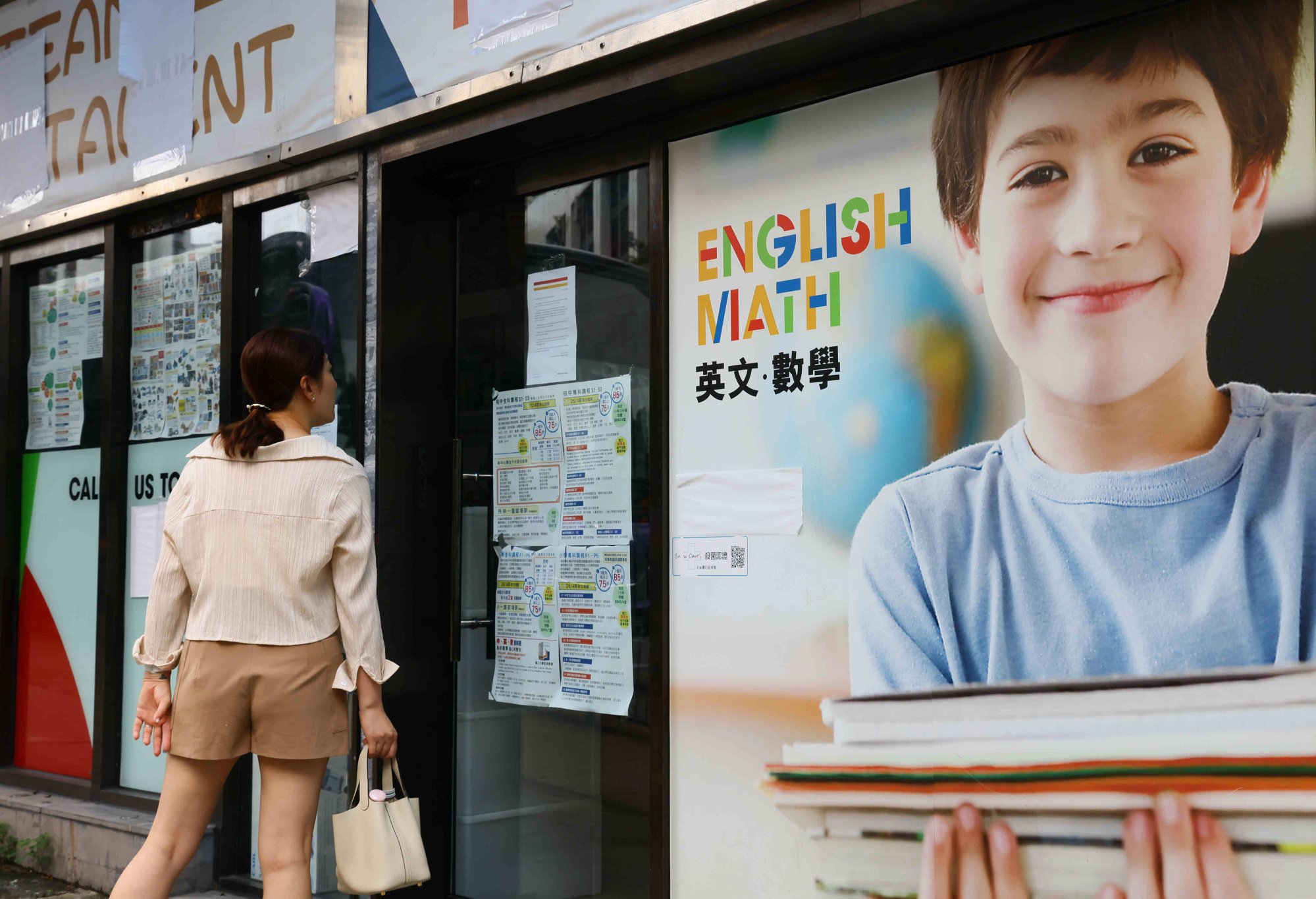 Hong Kong customs arrests director of tutoring centre chain Brilliant Education, as parents ...