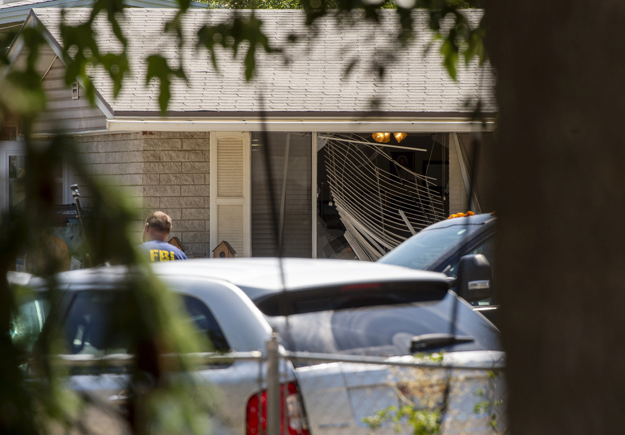 Armed US man accused of threatening Joe Biden shot dead in FBI raid ...