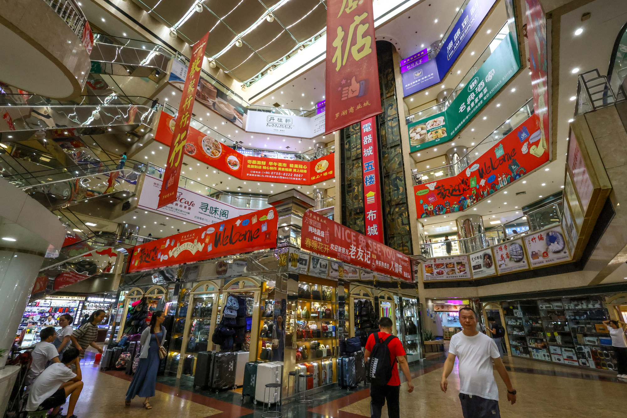 Penny-wise Hongkongers ditch city to shop, dine and play in Shenzhen ...