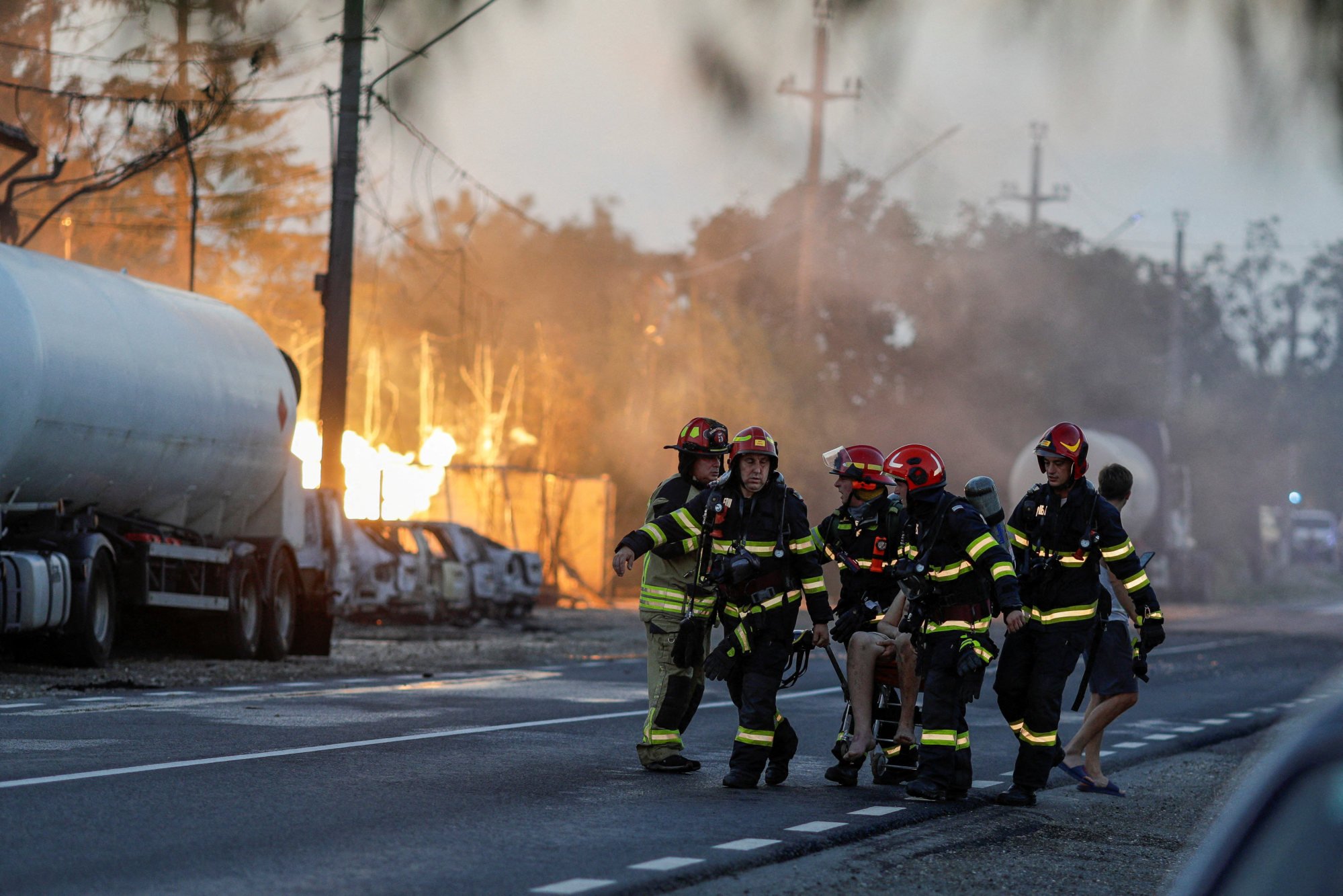 Two dead, 56 injured in Romania petrol station explosions | South China ...