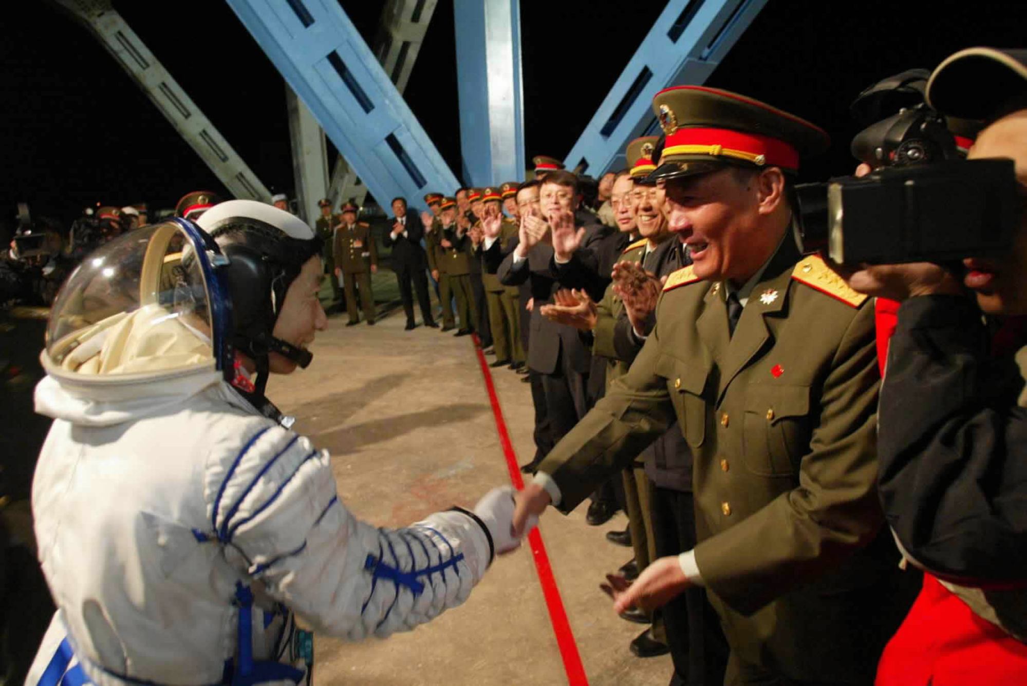 China sends its first astronaut, Yang Liwei, into space on board ...