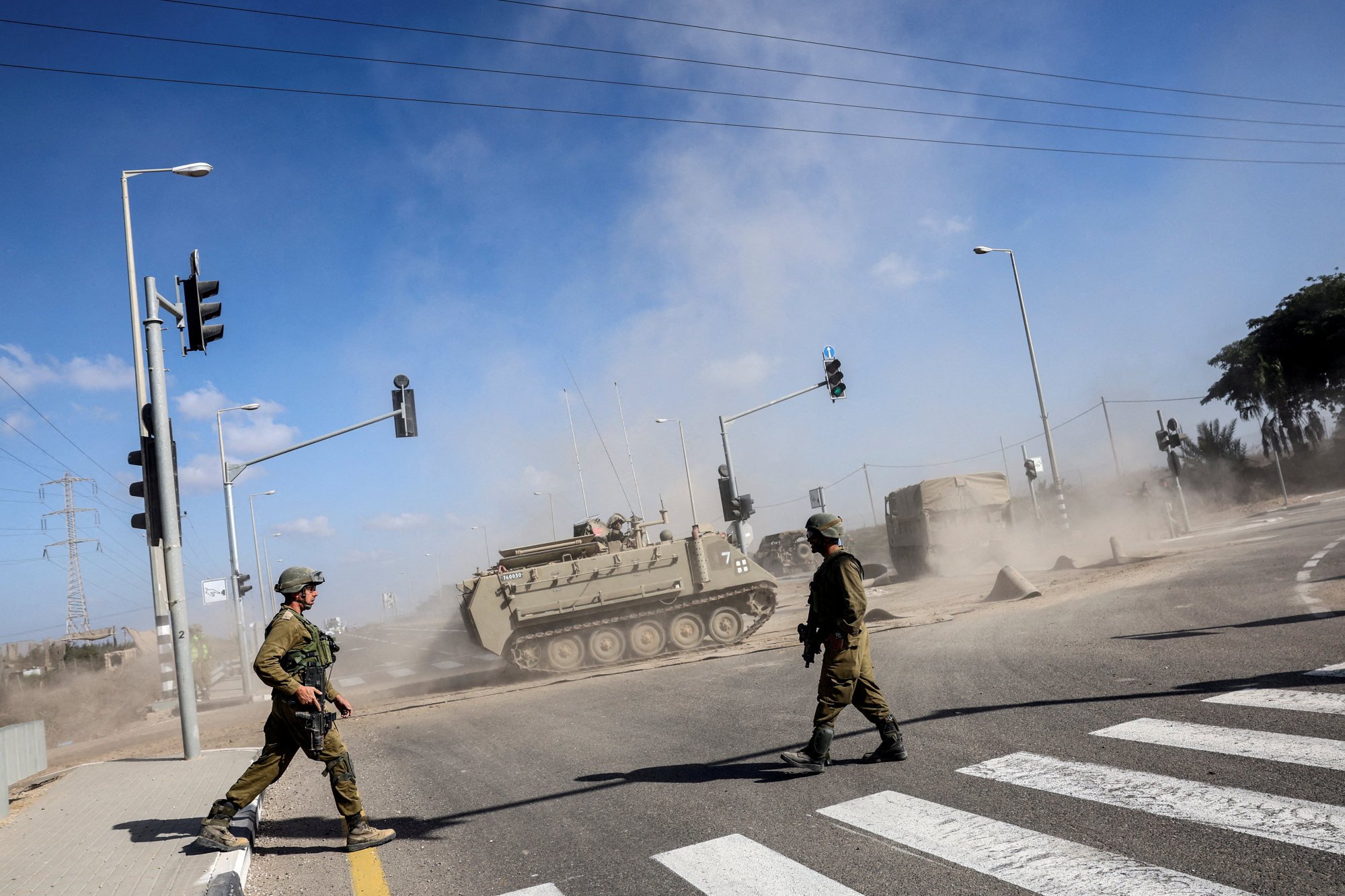 Israel calls for civilians to leave Gaza City as military amasses tanks ...