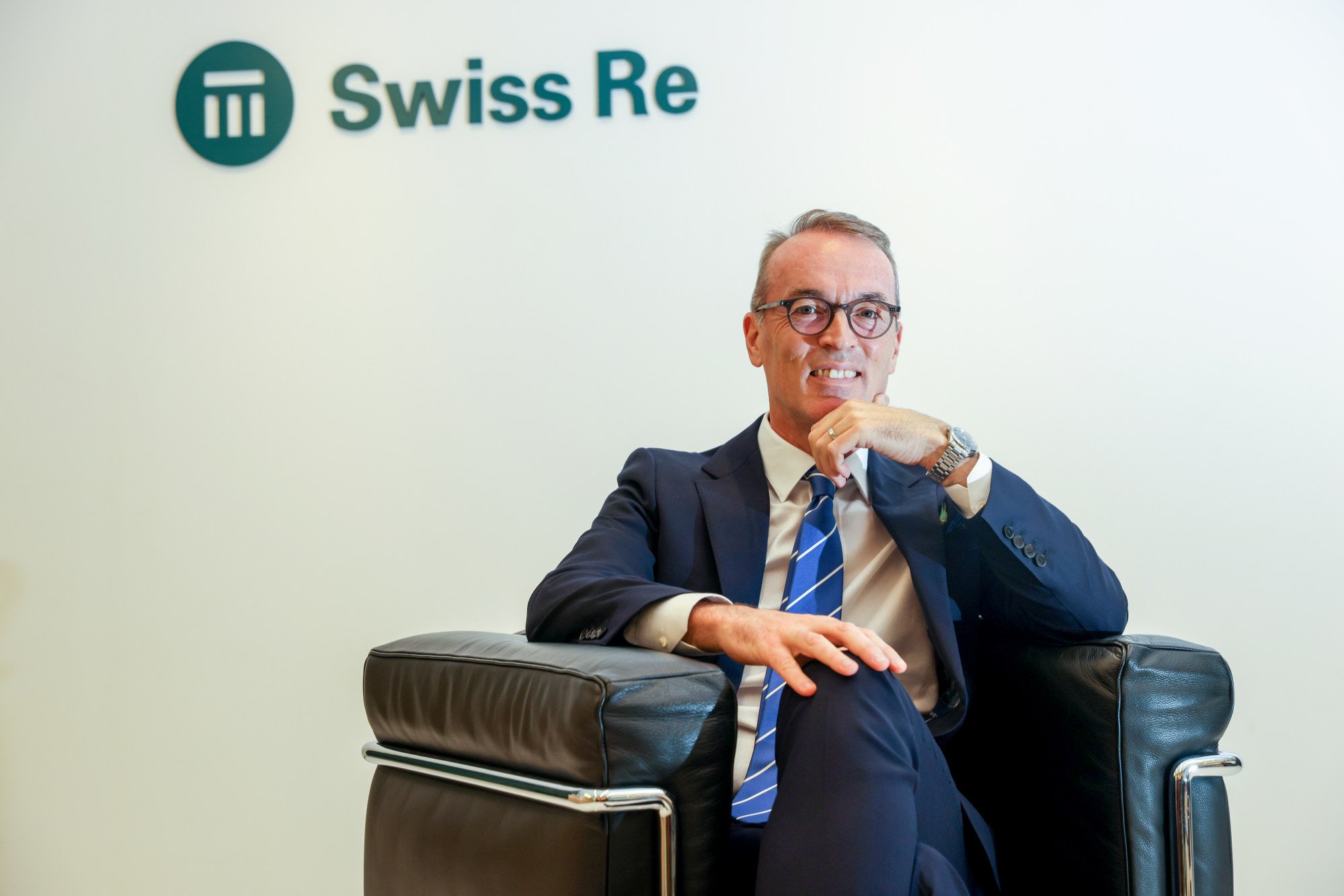 Swiss Re sees earnings boost from falling Covid-19 claims, targets ...