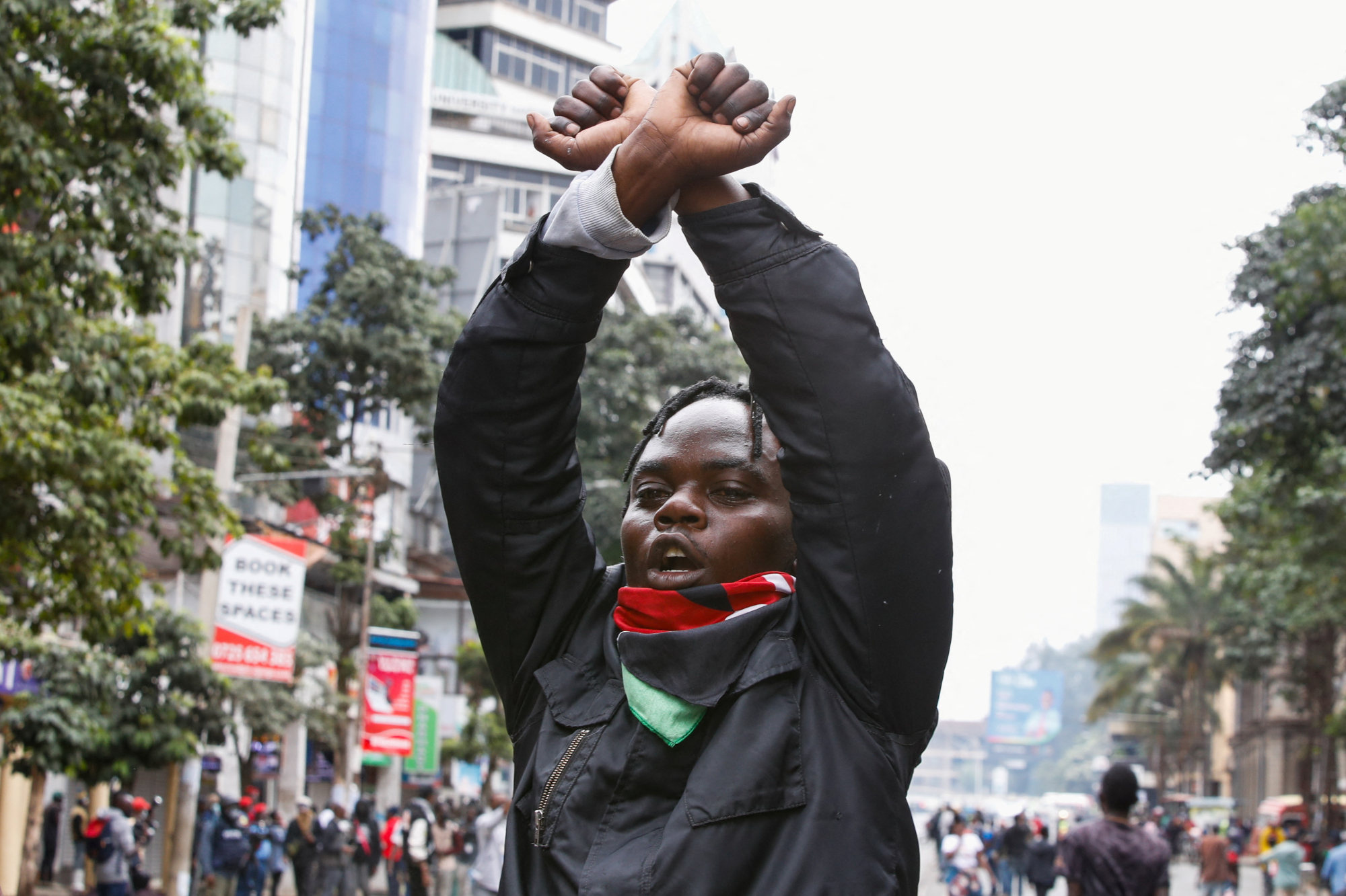 2 dead as Kenya police fire on protesters after president scraps tax ...