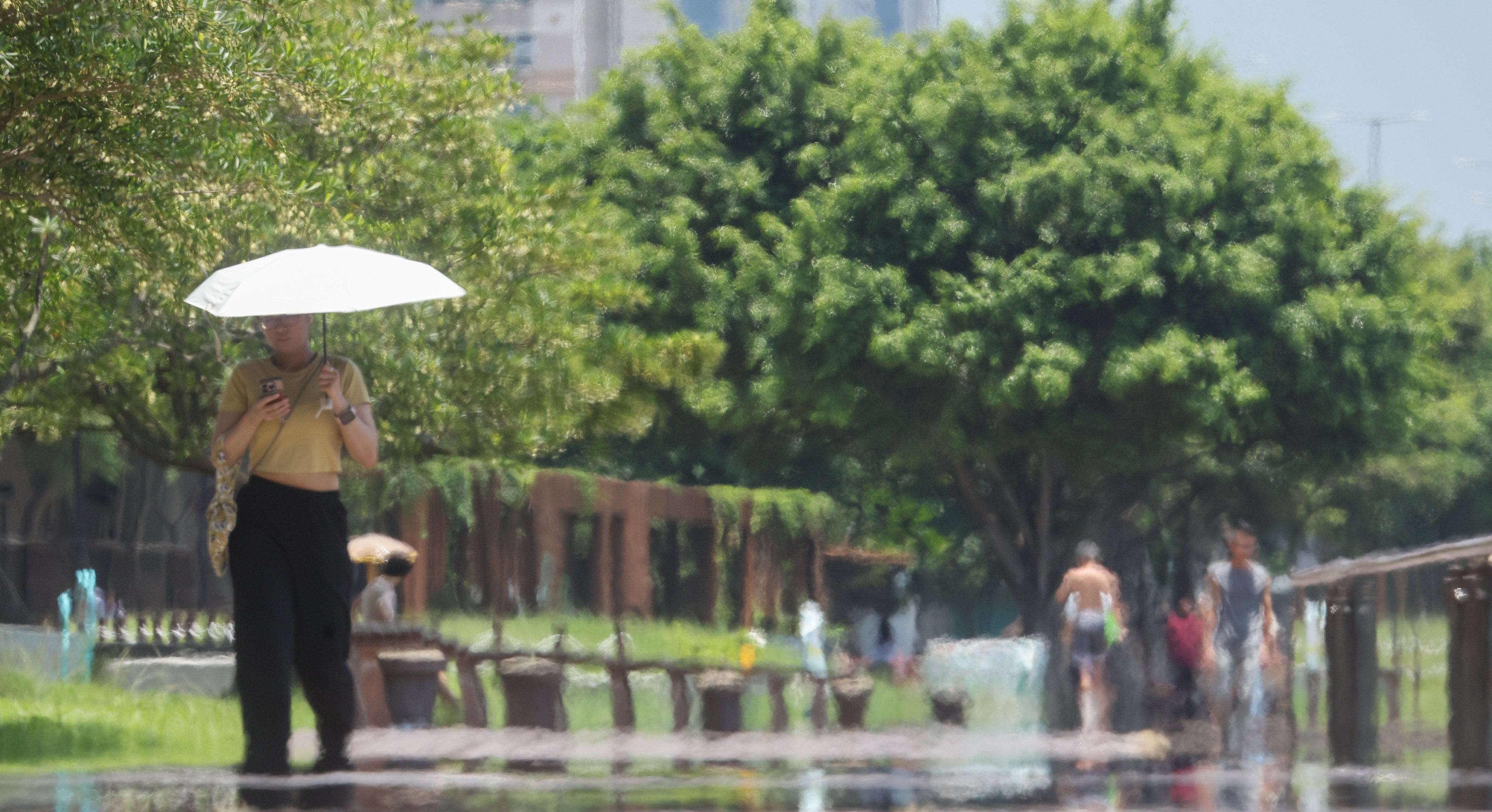 Hong Kong issues amber rainstorm warning after intense heatwave earlier ...