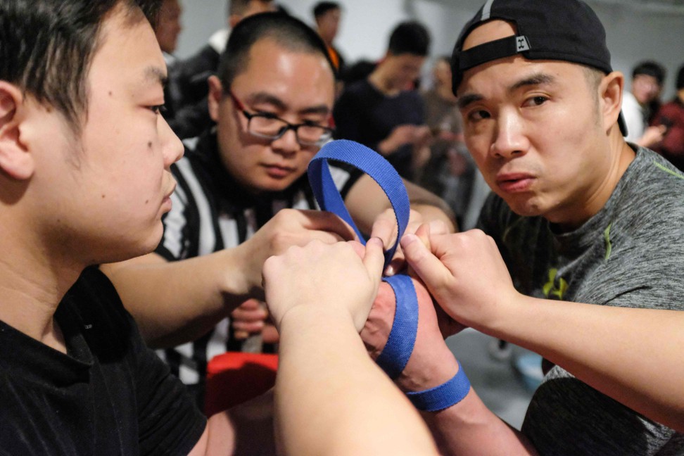 Arm wrestling in China proving gripping stuff as competitors hope to ...