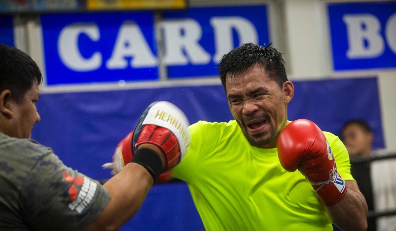Manny Pacquiao’s son Jimuel gets into the ring to join his father in ...
