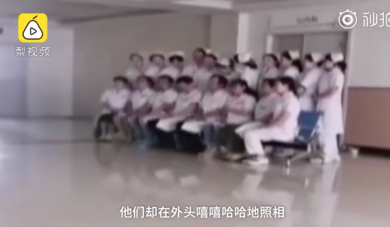 Chinese doctor accused of posing for photographs while woman fought for ...
