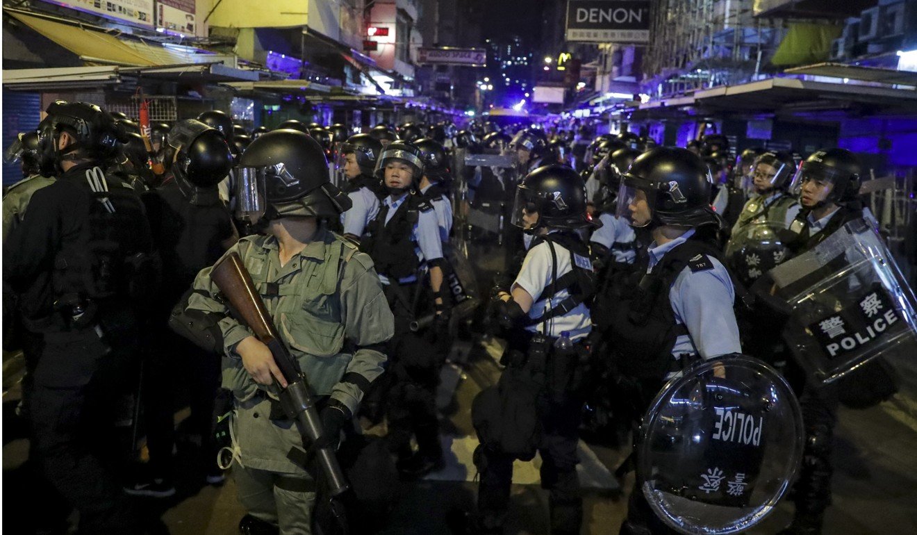 Hong Kong protests: riot police back in action after crowd gathers in ...