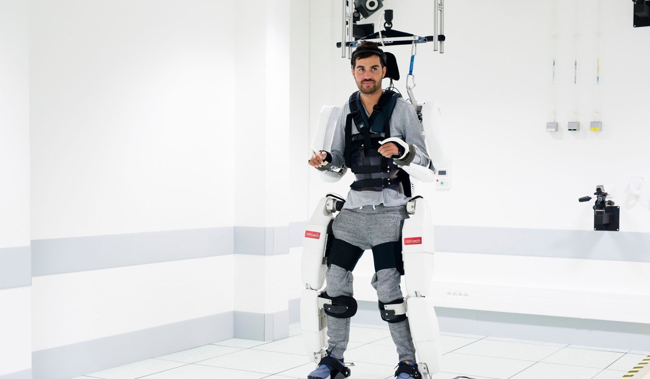 Paralysed man in France walks again with brain-controlled exoskeleton ...