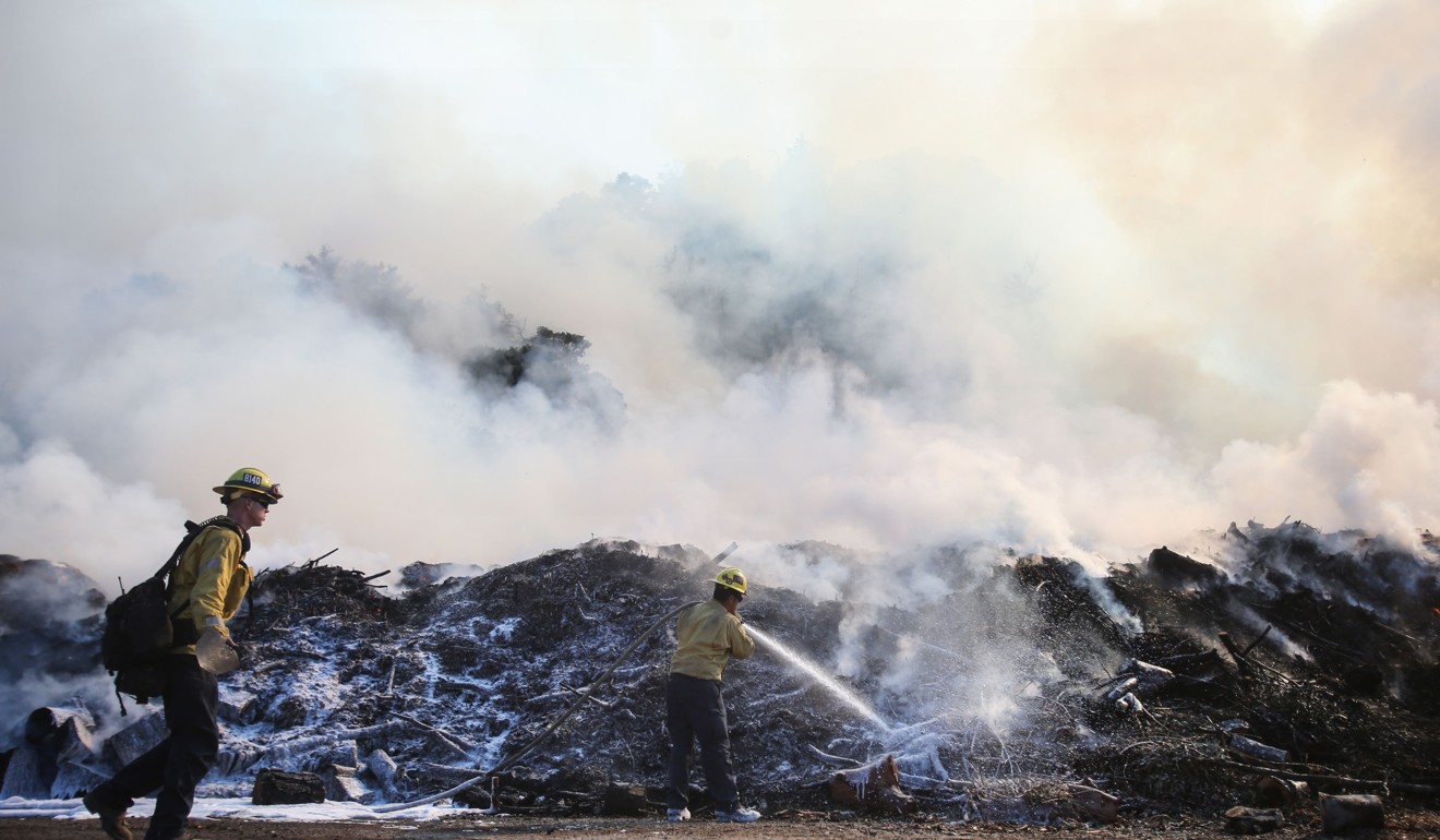100,000 evacuated as firefighters battle to contain southern California ...