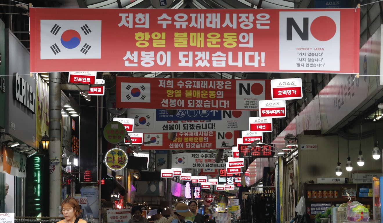 Japan and South Korea agree to mend ties after leaders’ first talks in ...