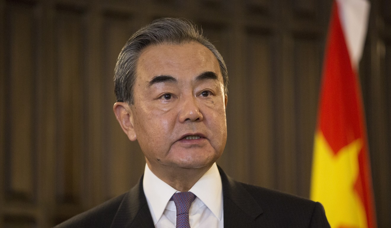 Chinese Foreign Minister Wang Yi says opponents of Taiwan reunification ...