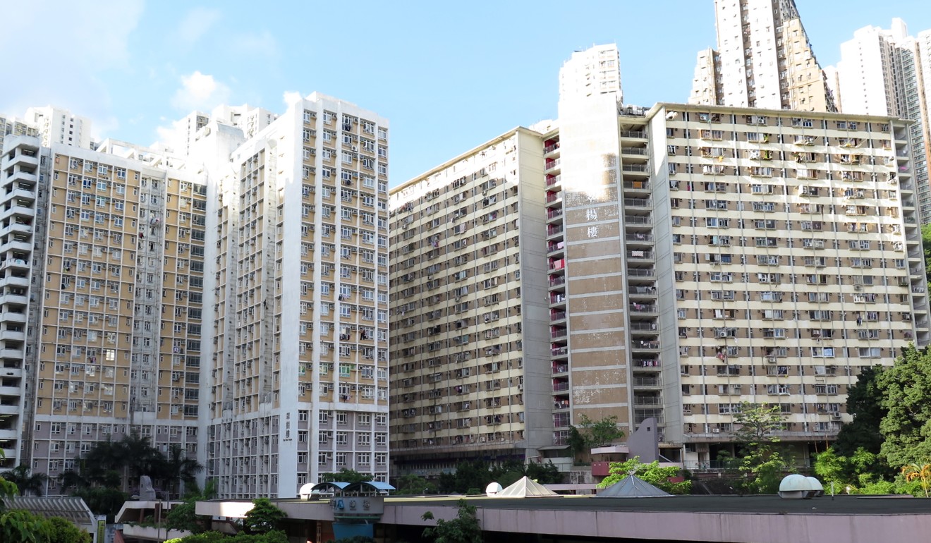 Firefighters break into Hong Kong public housing flat to rescue two ...