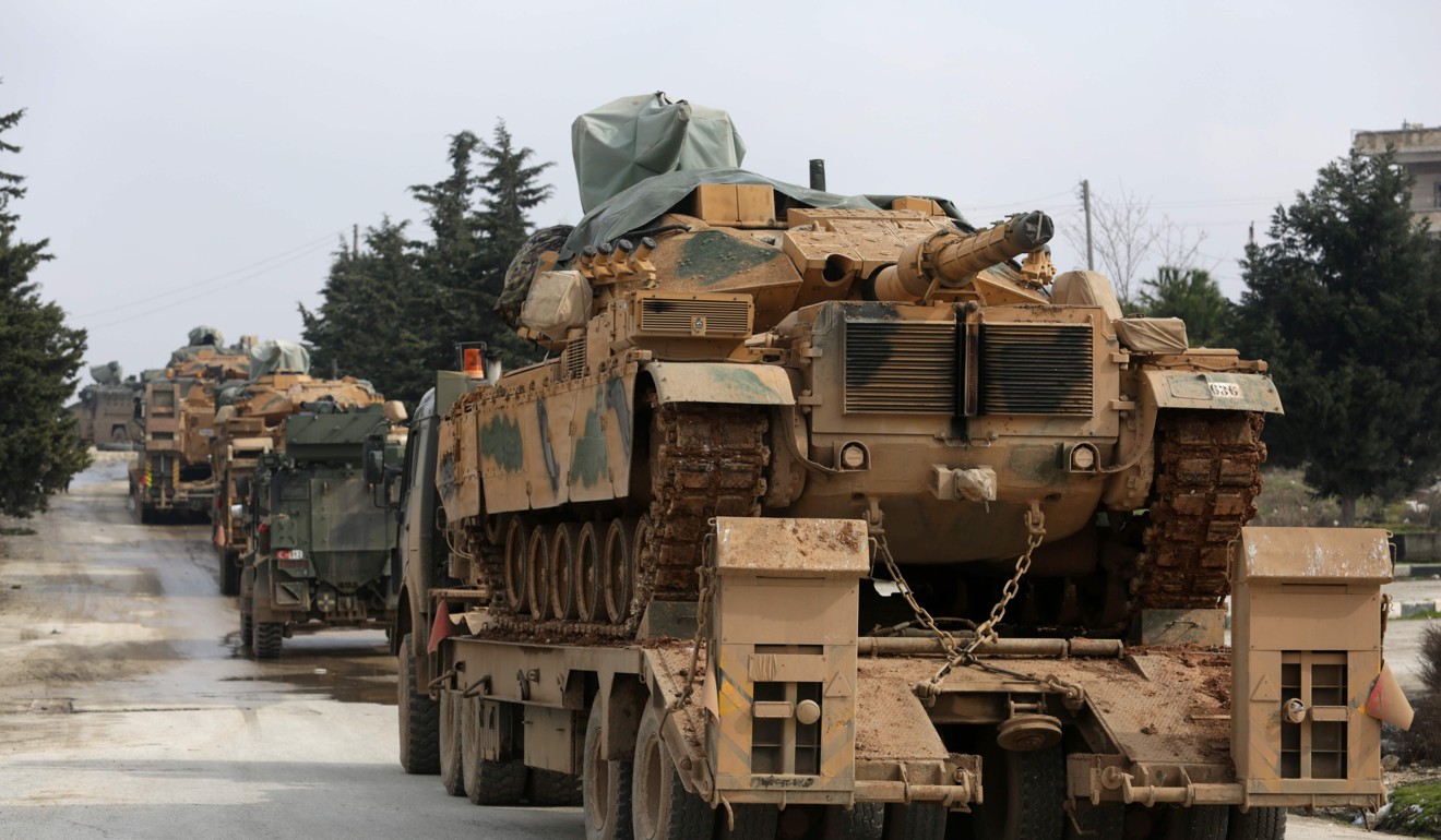 Turkey threatens to hit Syrian targets ‘anywhere’ as it masses tanks ...