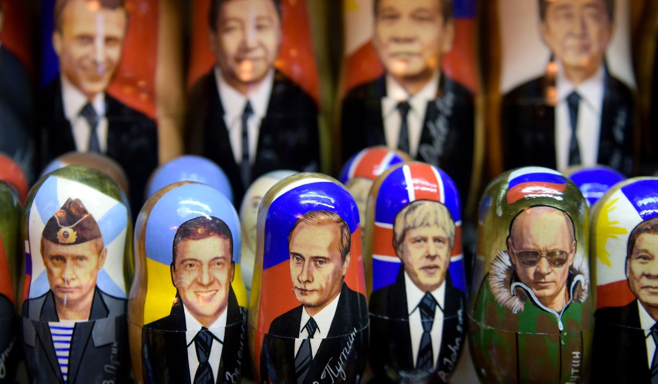 Vladimir Putin’s portraits are everywhere, including on T-shirts, mugs ...