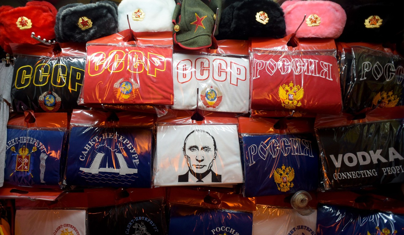 Vladimir Putin’s portraits are everywhere, including on T-shirts, mugs ...