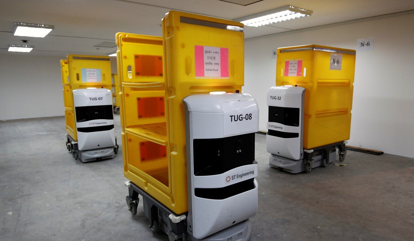 Inside Singapore’s sprawling coronavirus isolation centre, robots ...