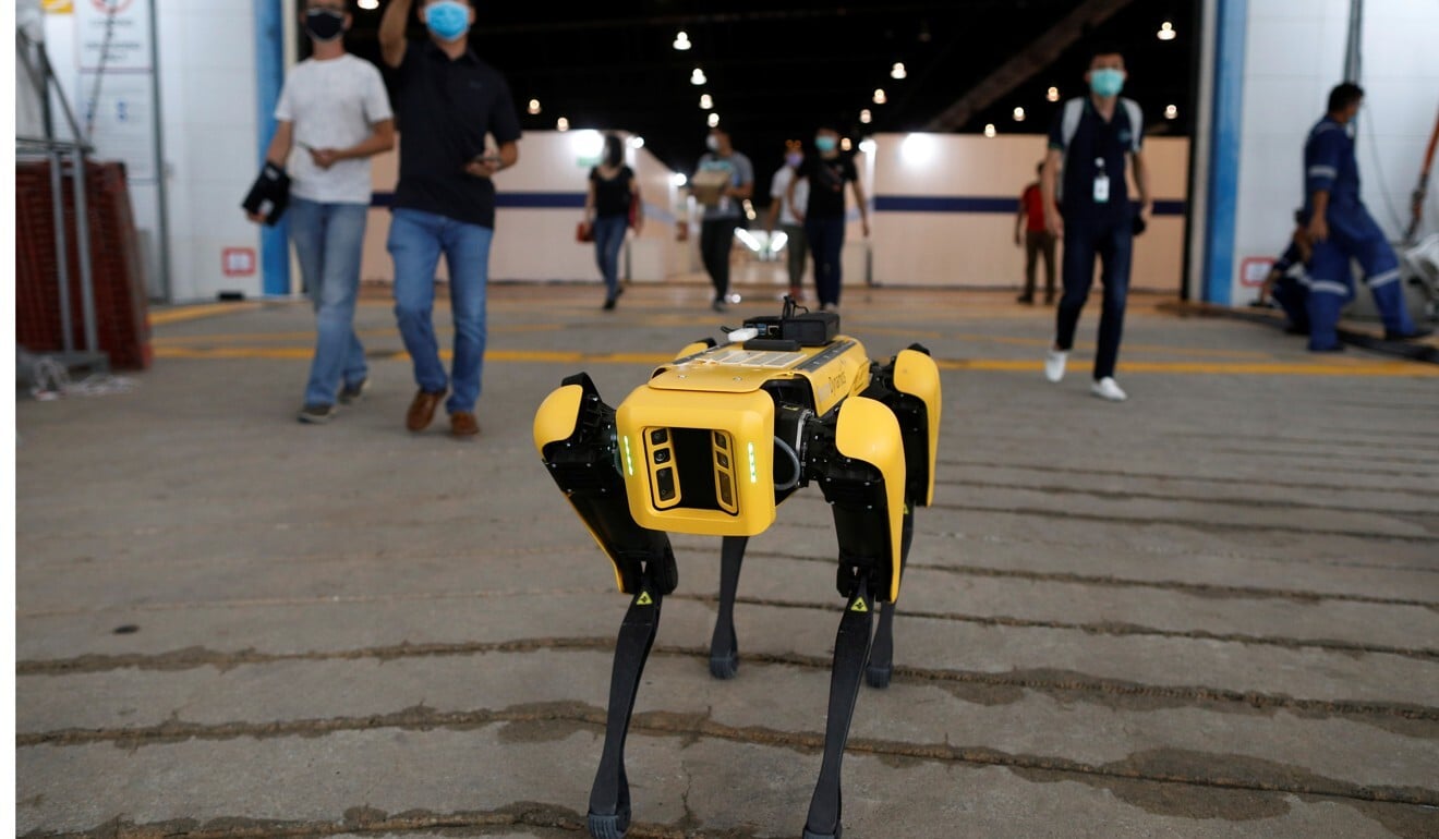 Inside Singapore’s sprawling coronavirus isolation centre, robots ...