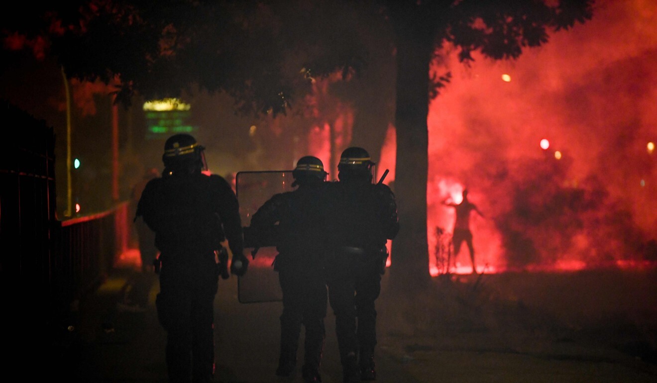 Fans clash with Paris riot police after PSG lose Champions League final ...